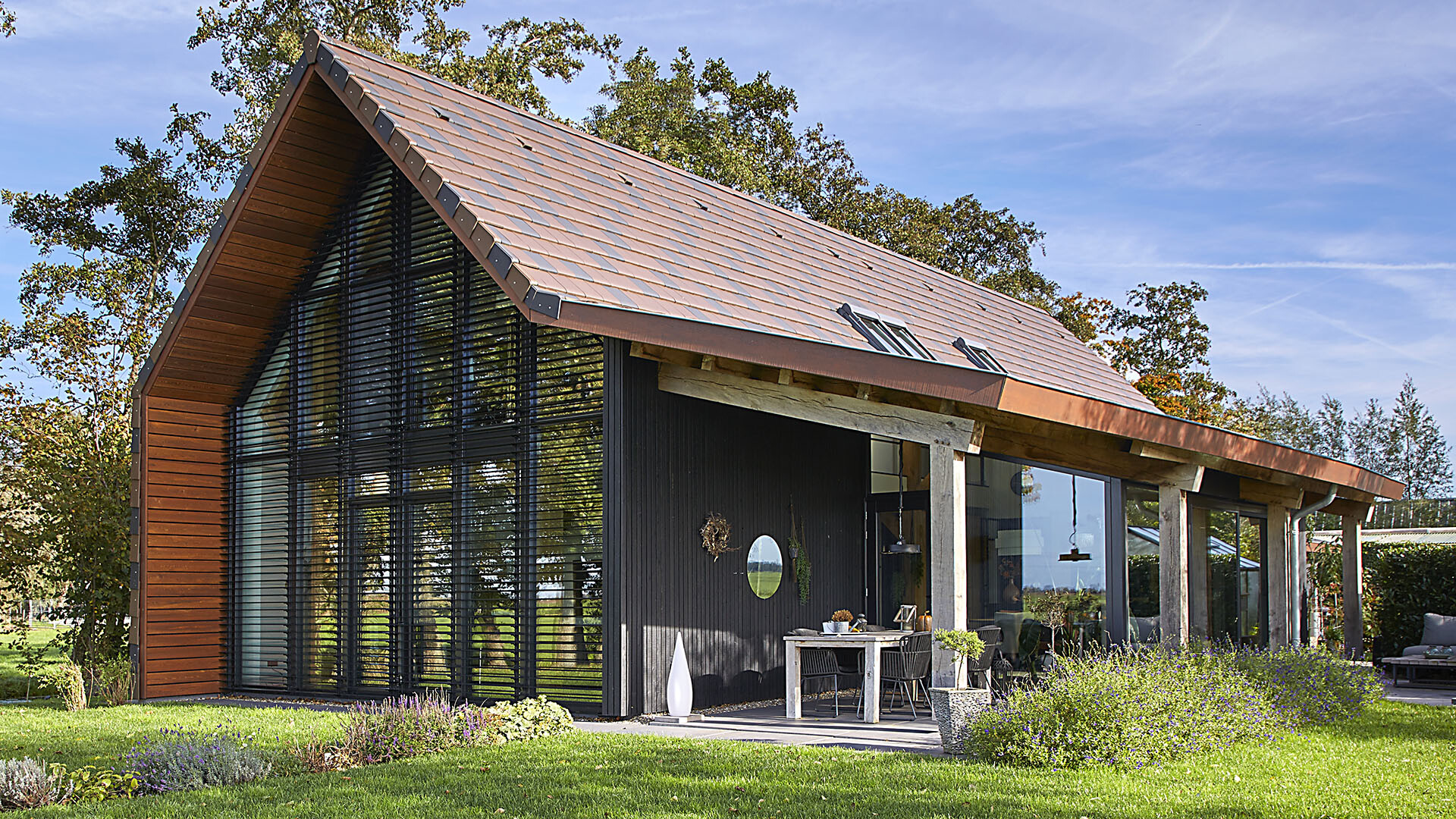 Modern barn house with unique louvers featured in The Art of Living ...